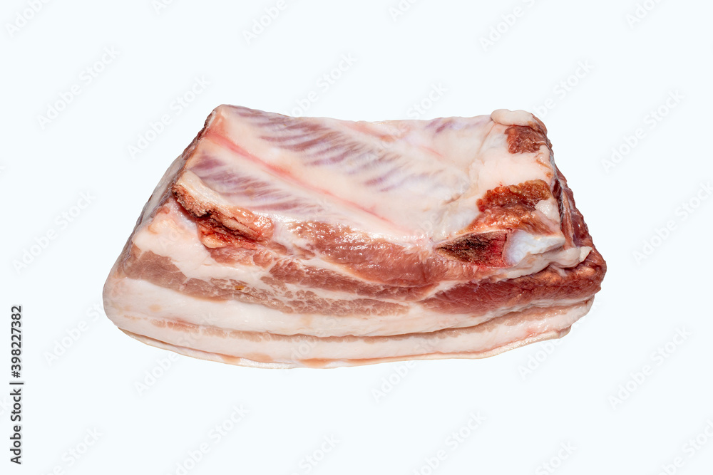 Fresh meat brisket with a layer of fat.A piece of pork belly on a white ...