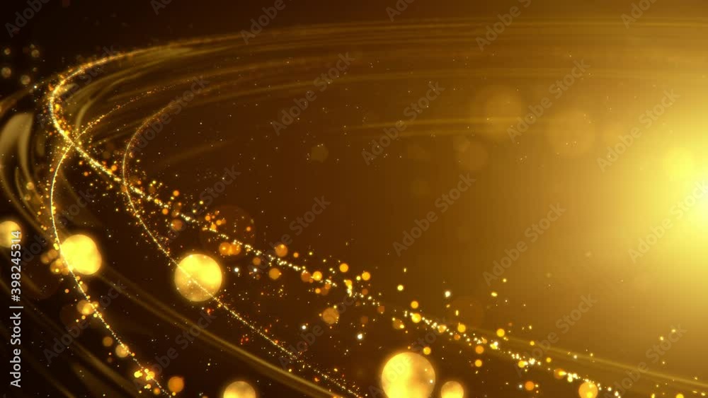 Golden particles with bokeh effect twirling in circles, full of dreamy ...