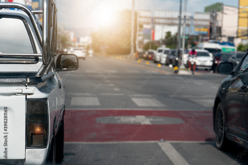 Stopping of cars parked at the front end of the intersection waiting ...