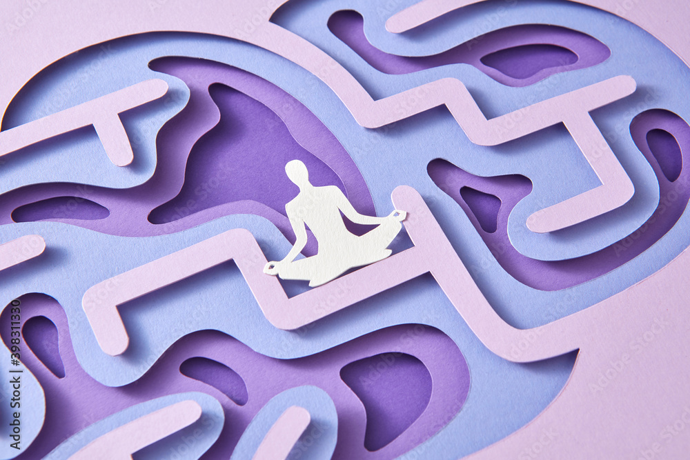 Paper handmade configuration of human brain with meditating man. Stock ...