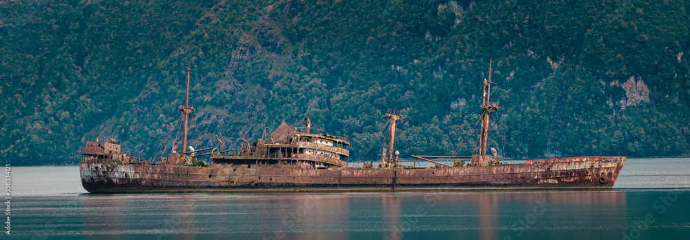 remains of the sunken ship Captain Leonidas in the fjords of southern ...
