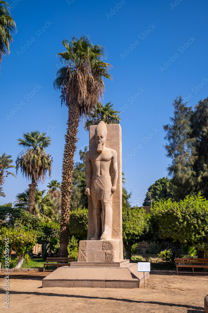Detail of the sculpture between the palm trees of Pharaoh Ramses II at ...