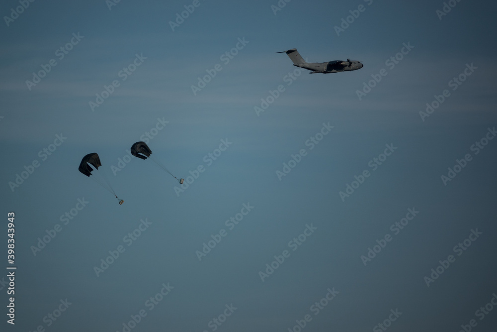 airbus a400m transporter aircraft releasing two cargo drops on ...