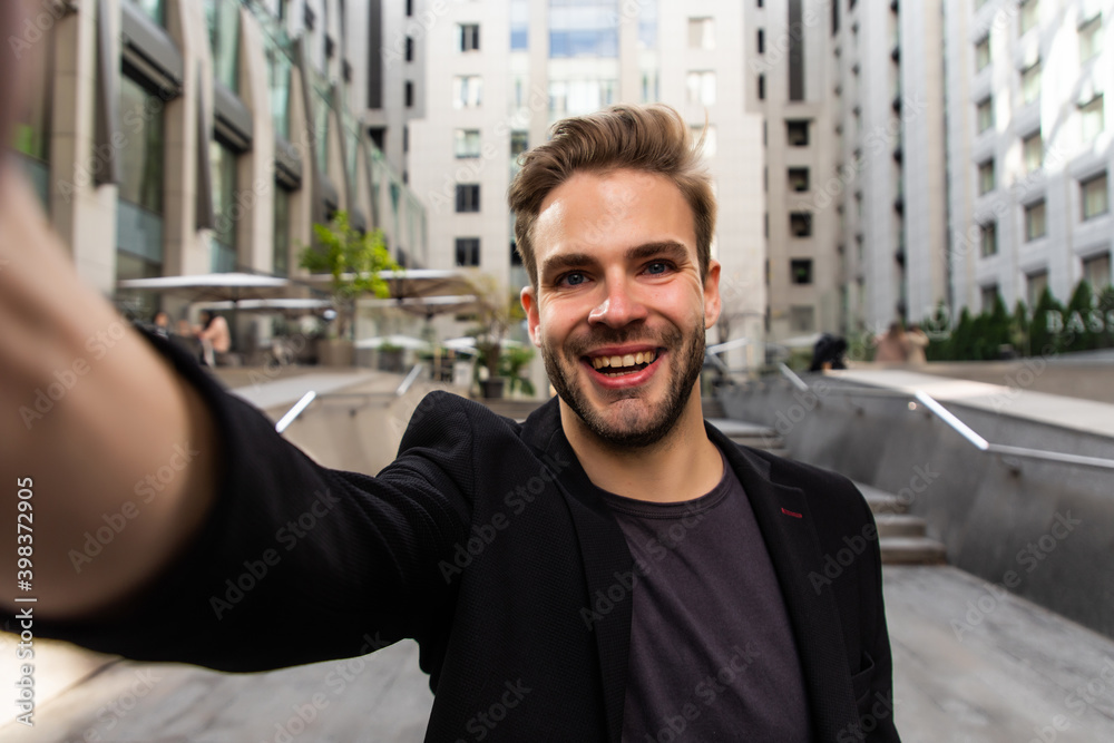 Beautiful businessman dressed in formal suit smiling at camera and ...