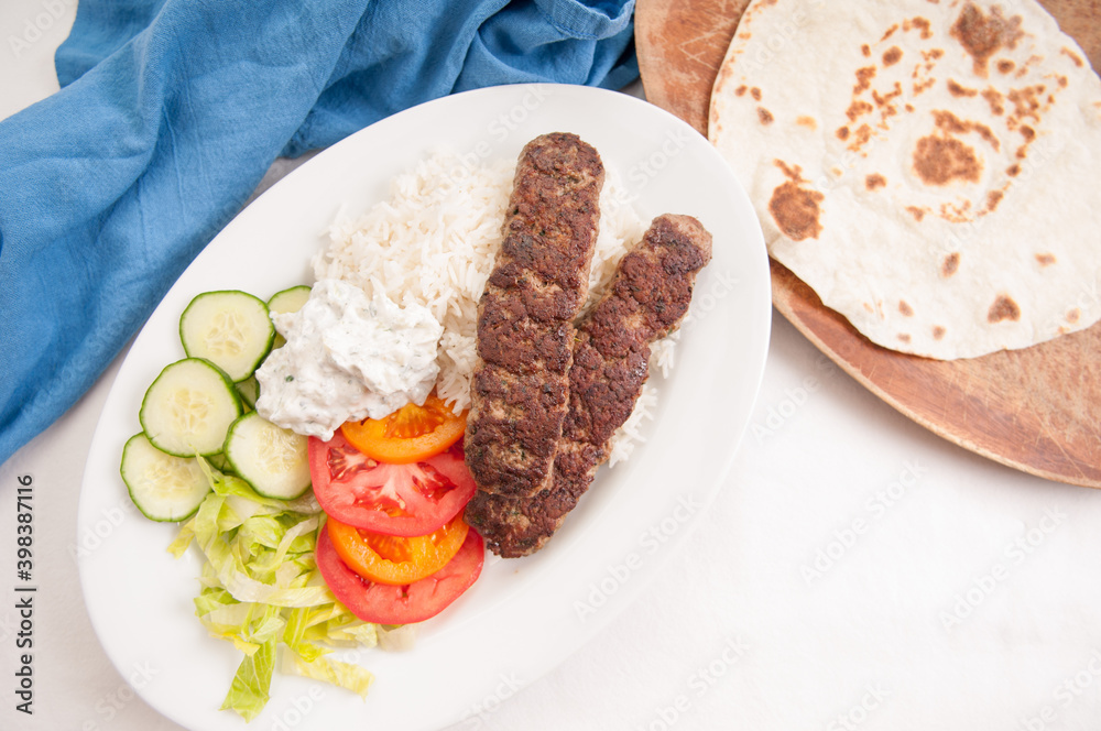 koobideh ground lamb with rice and vegetables, Stock Photo | Adobe Stock
