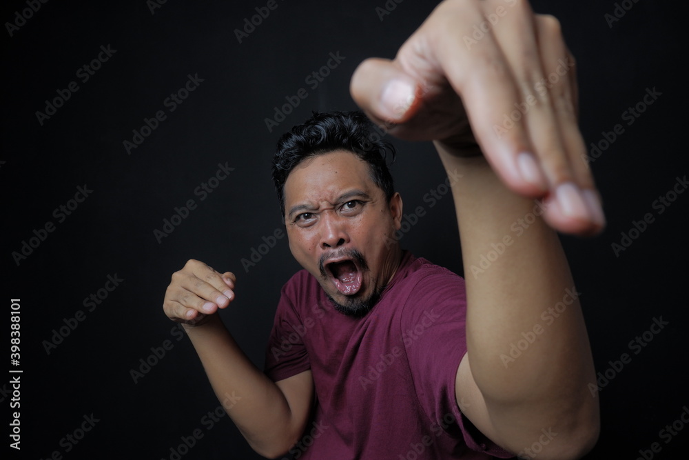 kungfu stance of funny asian man, can be used in frightened, shocked or ...