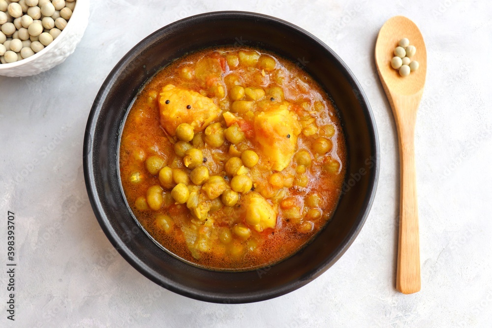 Indian popular homemade Aloo Matar. Potatoes and peas curry. Vatana ...