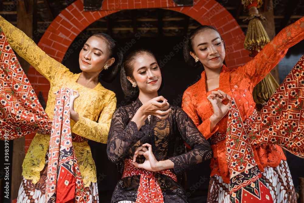 portrait of a young woman wearing Javanese kebaya traditional clothes ...