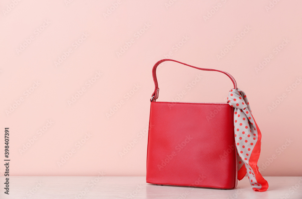 Stylish bag on color background Stock Photo | Adobe Stock
