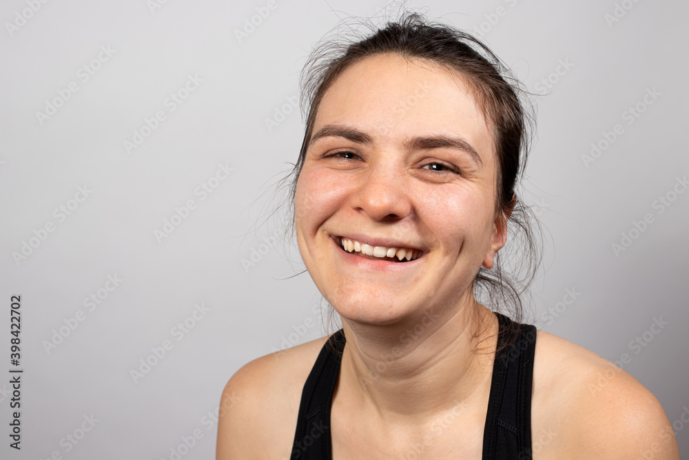 A woman of 28 years without makeup laughs. Life without cosmetics, the ...