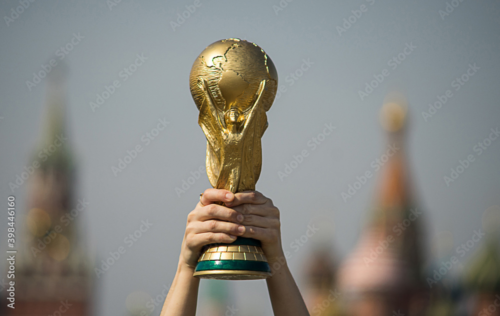 April 16, 2018 Moscow. The man holds the Trophy of the FIFA World Cup ...