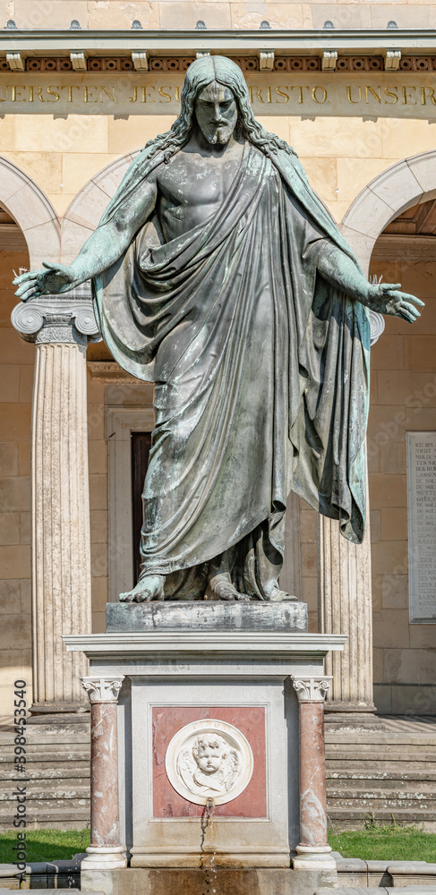 Old statue of Jesus Christ with open arms at the ancient church called ...