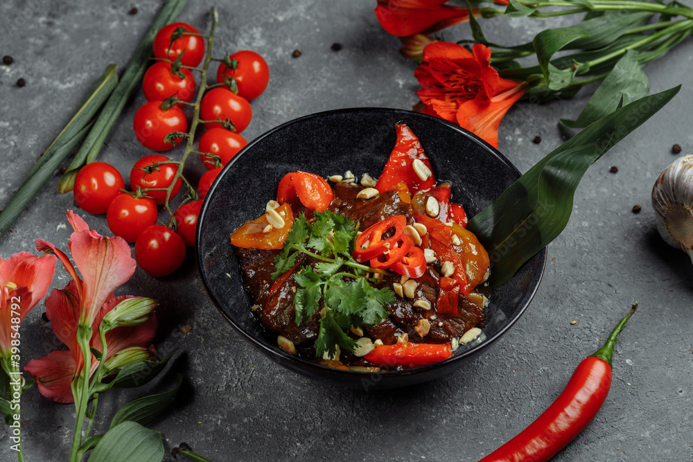 Beef wok. Traditional chinese mongolian beef stir fry in chinese cast ...