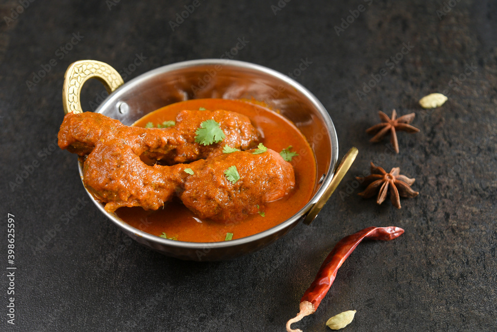 Spicy red chicken curry. Goan style chicken vindaloo. Butter chicken ...