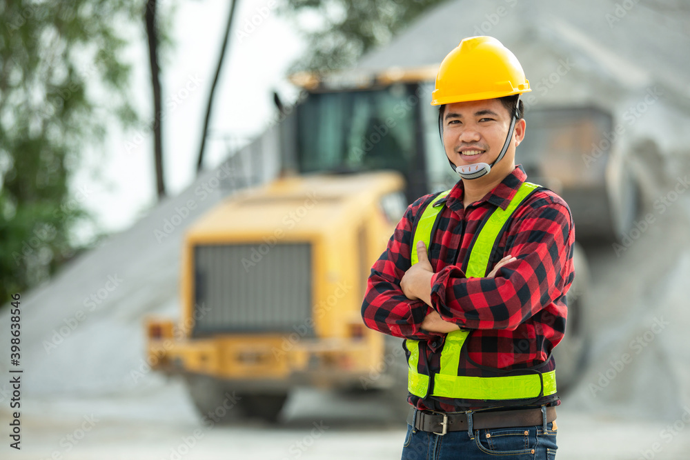 Engineer wear safety uniform backhoe excavator and bulldozer on ...