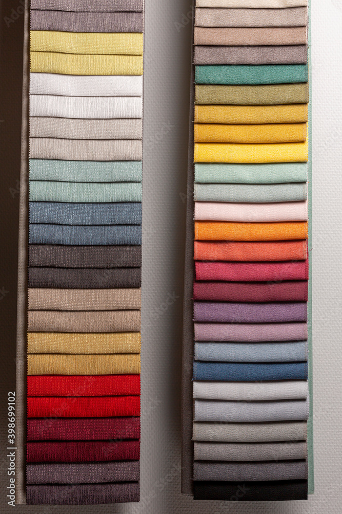 Contrasting gray wall with couple of interior design sample swaps of ...