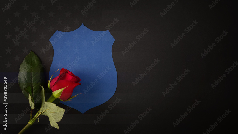 Blue shield with a red rose draped across it. National Law Enforcement ...