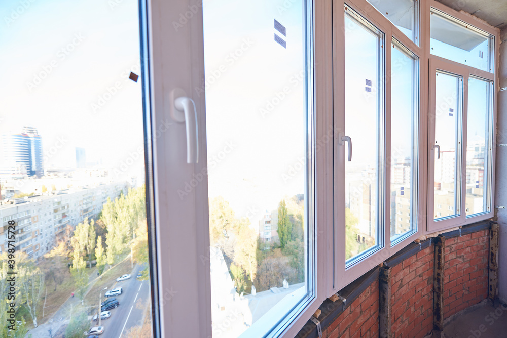 Installation of a plastic window in the living room of the apartment ...