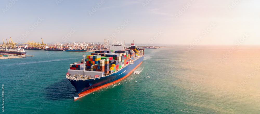 Aerial side view of cargo ship carrying container and running, webinar ...