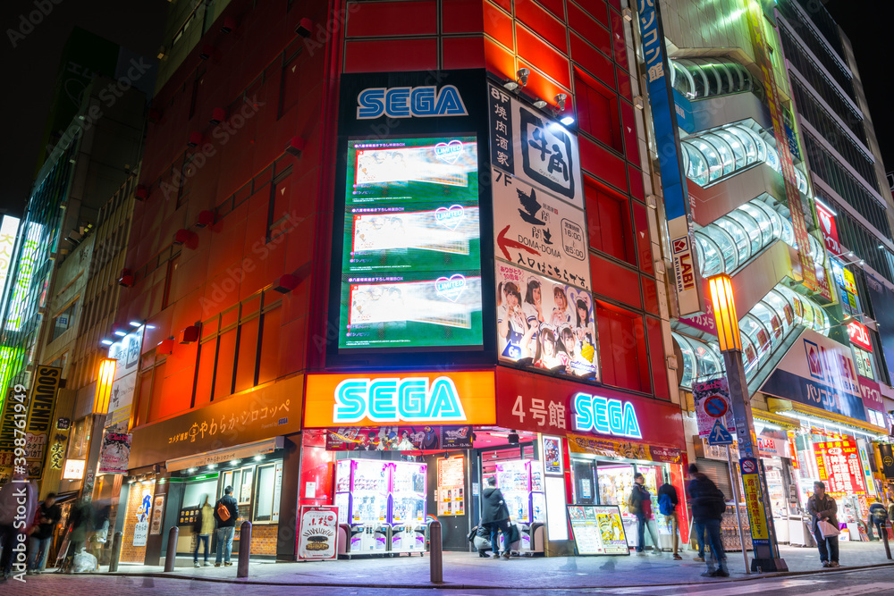 TOKYO, JAPAN - 18 NOV 2018 : The Sega arcade center and a building with ...