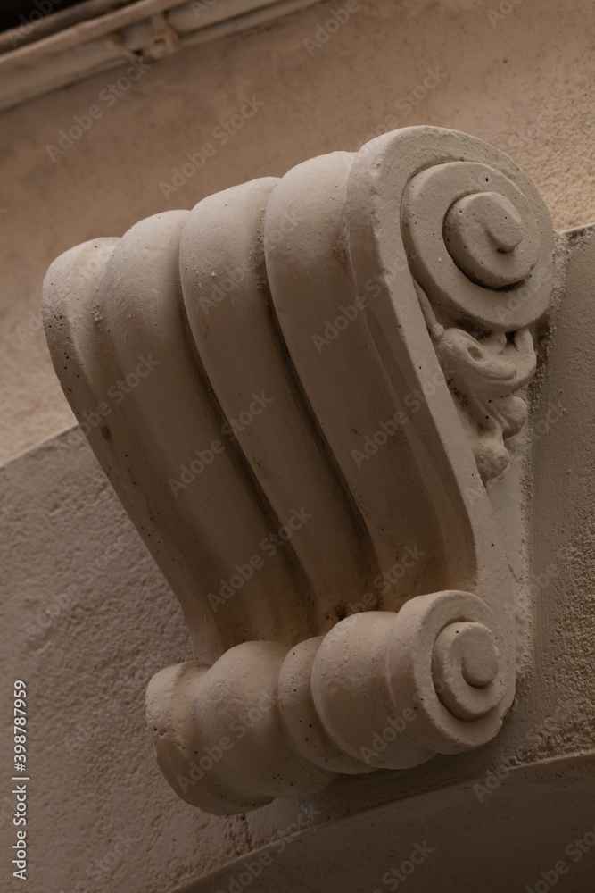 Elements of architectural decorations of buildings, a beam under the ...