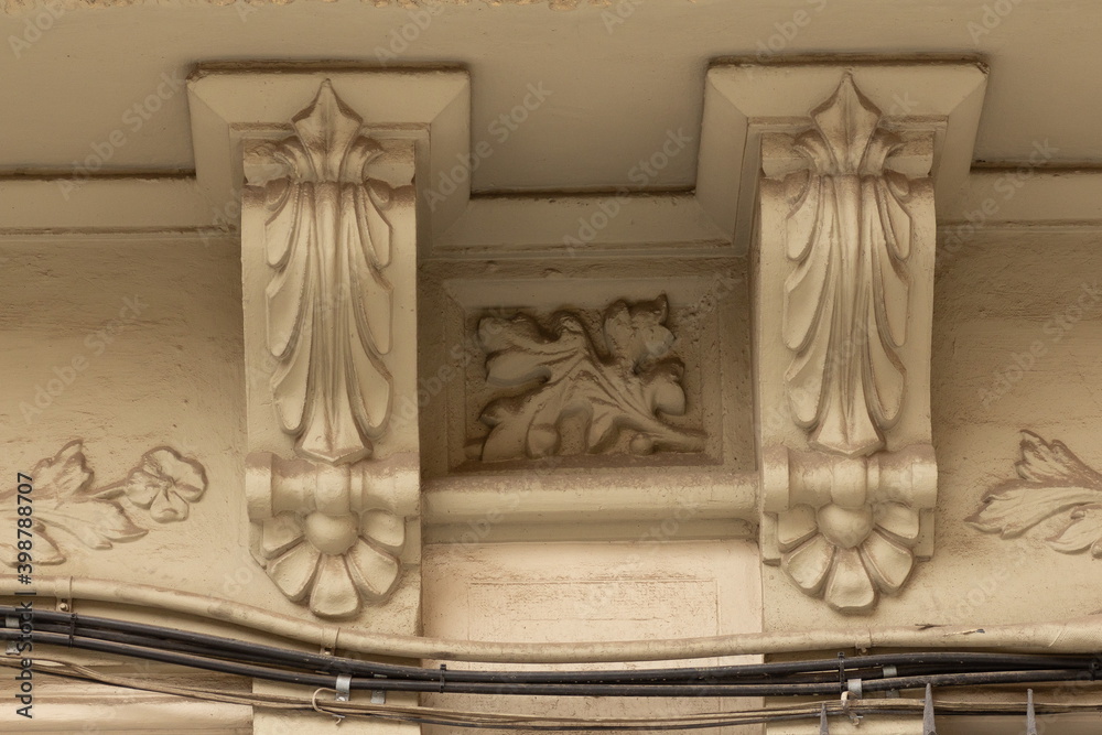 Elements of architectural decorations of buildings, a beam under the ...