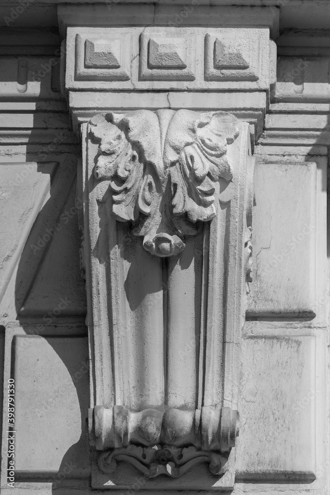 Elements of architectural decorations of buildings, a beam under the ...