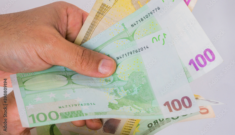 Abstract and conceptual of Banknotes in hand and money, in euros, close ...