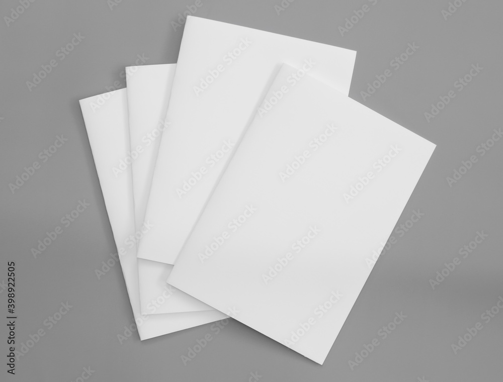 White paper mock-ups isolated on gray background, Blank portrait paper ...