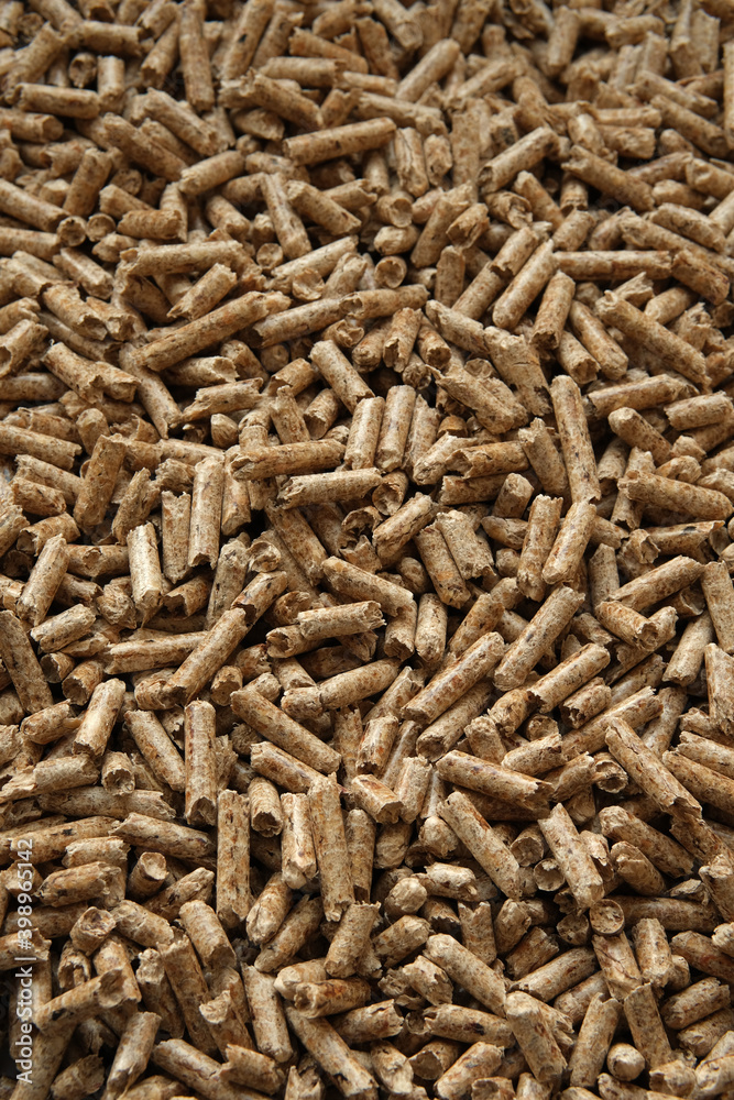 Wood pellets texture. Granules made from compressed wood and used as ...