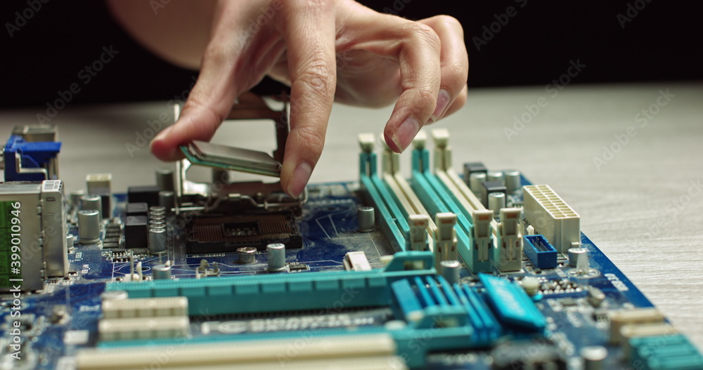 A gloved holds a processor. Close-up Presentation of a New Generation ...