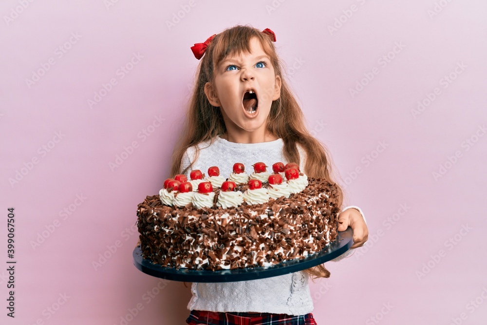 Little caucasian girl kid celebrating birthday holding big chocolate ...