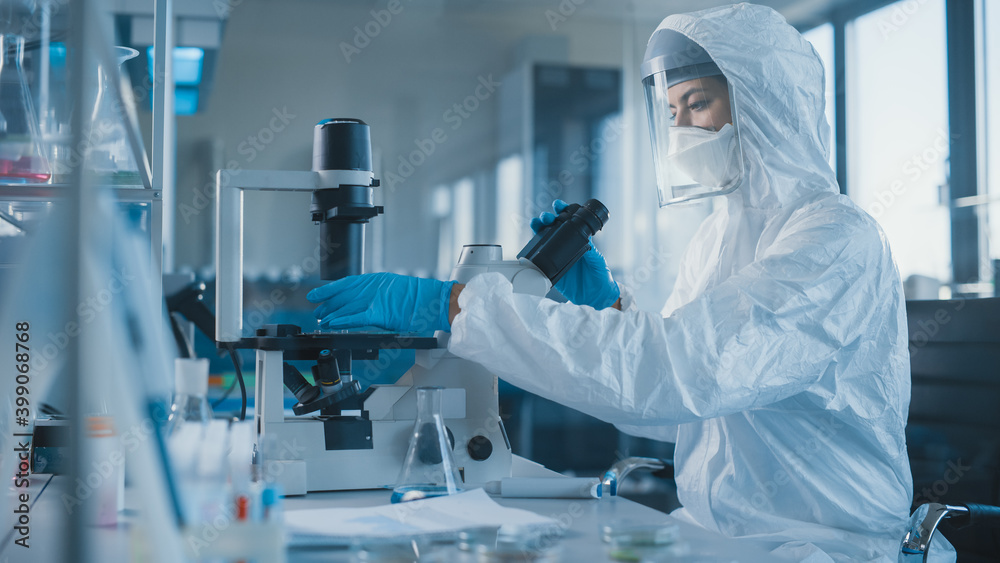 Beautiful Female Medical Scientist Wearing Coverall and Face Mask ...