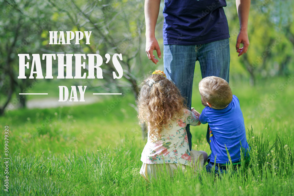 Text Happy father's day concept. children grabbed father's legs. Father ...