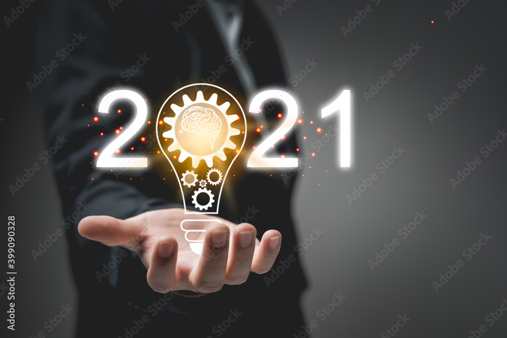 In 2021 a new beginning target, a man wears a suit and has a light bulb ...