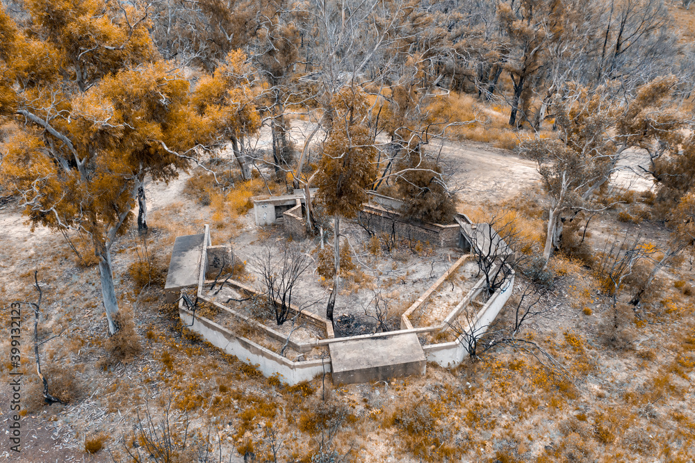 Aerial photograph of structural ruins and forest after bushfires in ...
