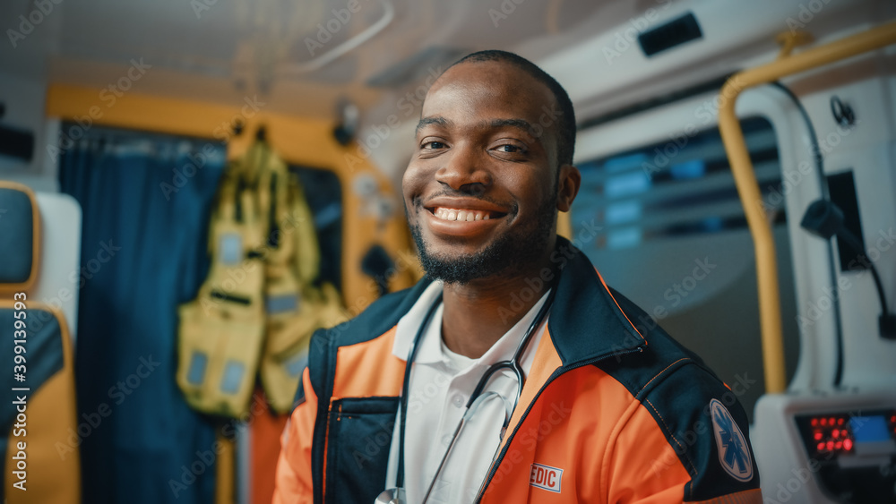 Happy Black African American Paramedic Smiles and Poses for Camera in ...