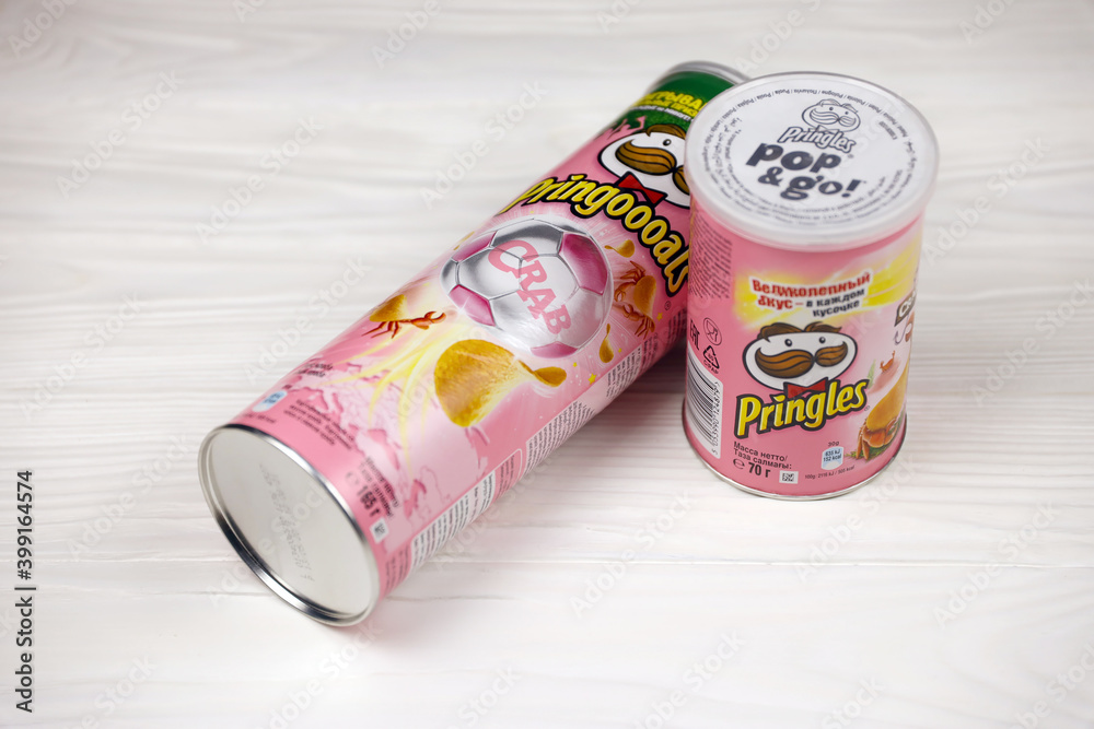 Pringles crab flavour. Cardboard tube cans with Pringles potato chips ...