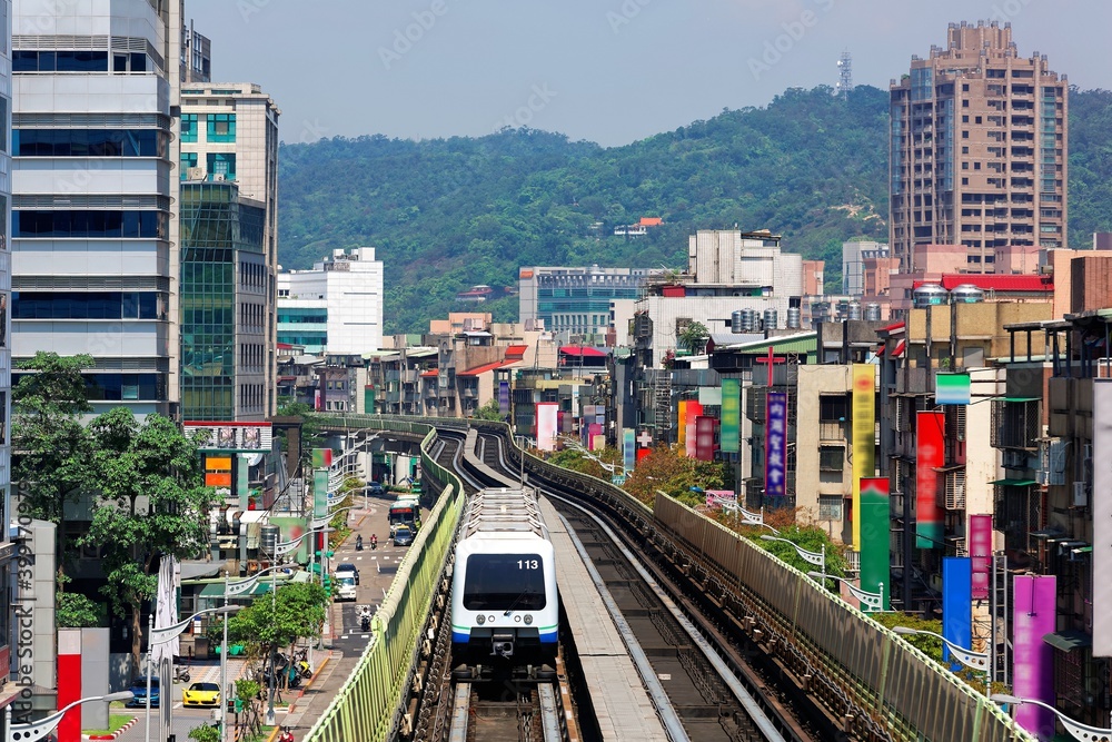 Scenery of a train traveling on elevated rails of Taipei Metro System ...