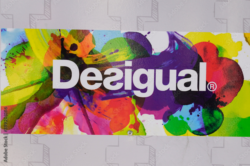 desigual logo and sign text front of store fashion brand clothes shop ...
