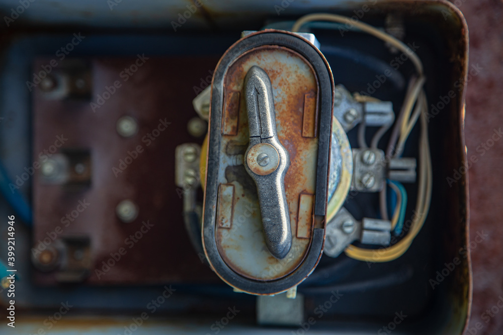 On rough wall, floor, paint peels off. Corrosion and rust of metal ...
