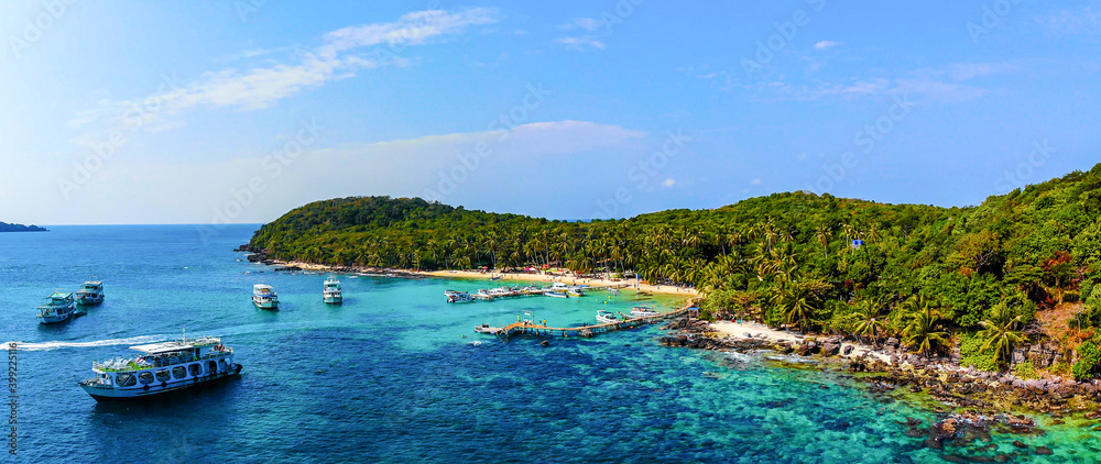Aerial view of beautiful landscape, tourism boats, and people swimming ... Aerial view of beautiful landscape, tourism boats, and people swimming ...