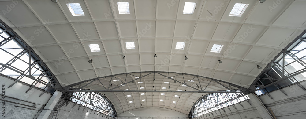 Hemispherical reinforced concrete load bearing roof with windows in ...