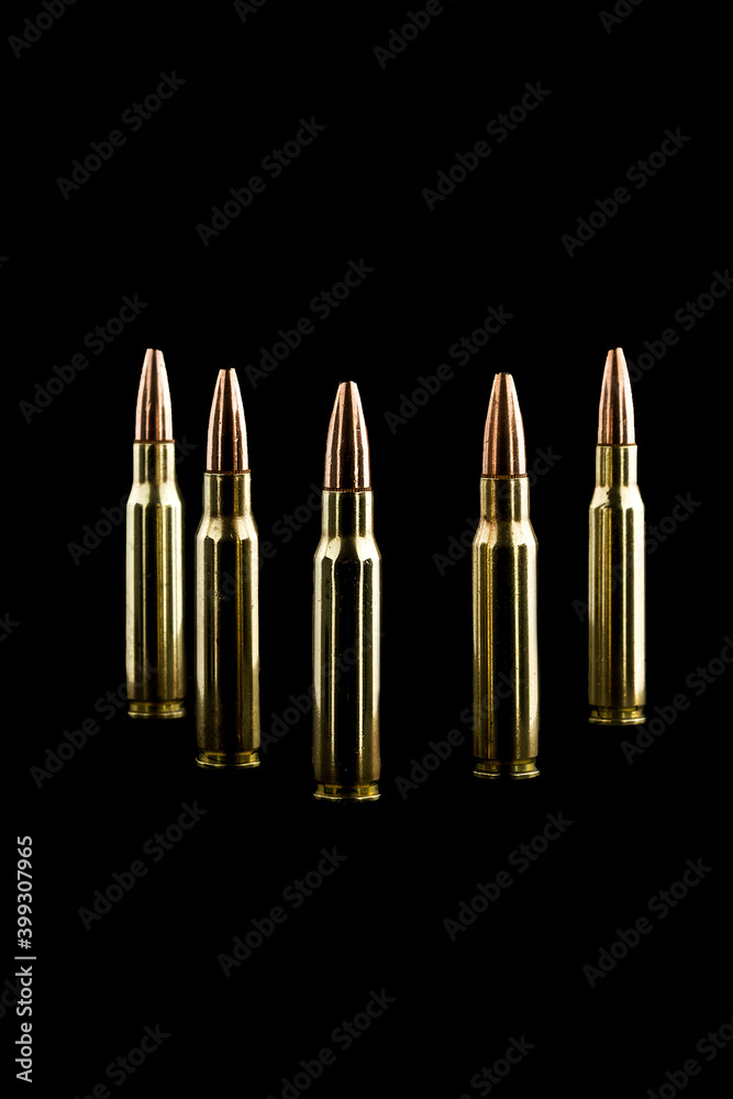 Conjunto de balas sobre fondo negro Stock Photo | Adobe Stock