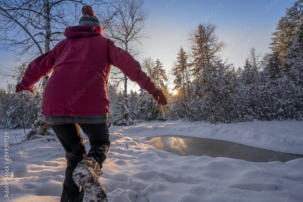 winter landscape, sunset sky, having fun outside, jumping people, woman ...