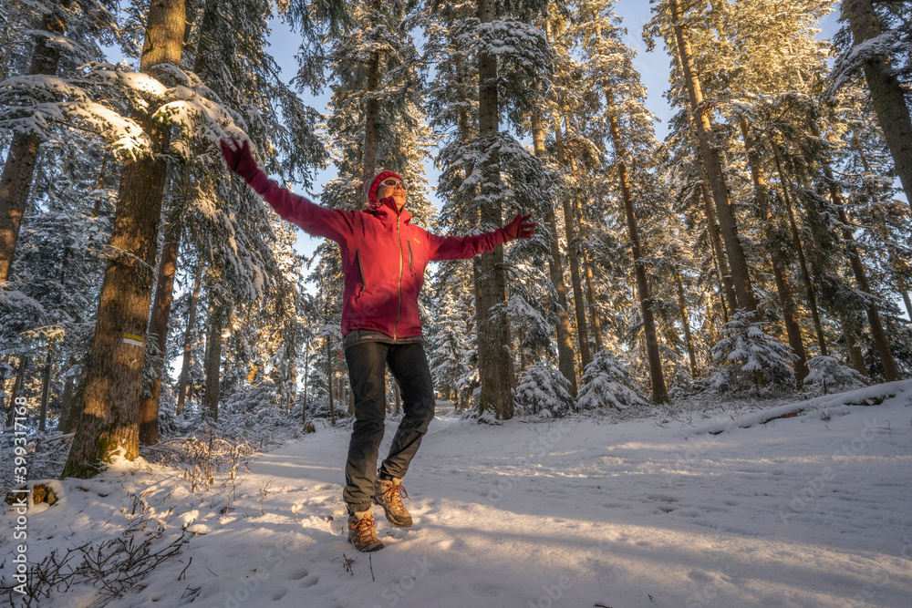 winter landscape, sunset sky, having fun outside, jumping people, woman ...