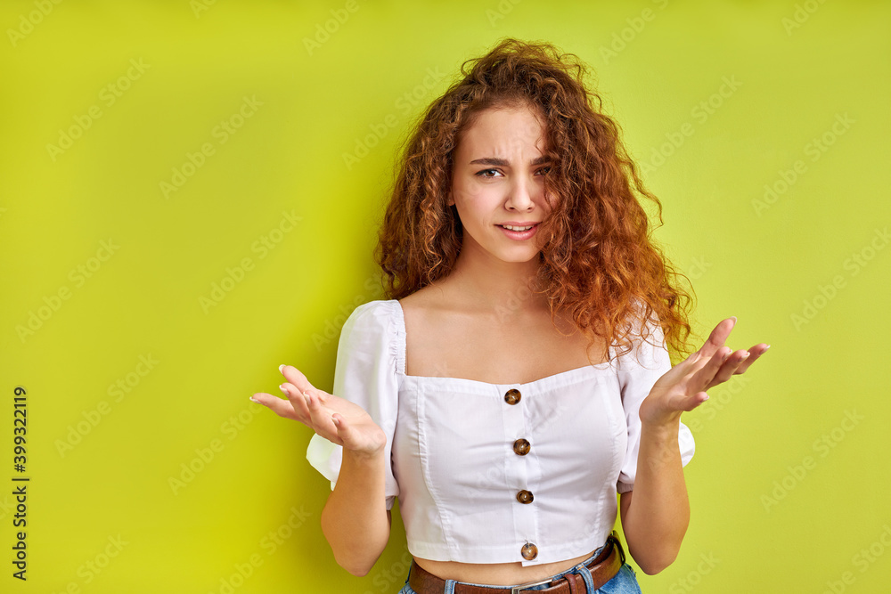 angry unhappy young woman with arms out asking what is problem isolated ...