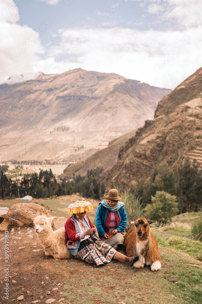 Peruvian women working together Stock Photo | Adobe Stock