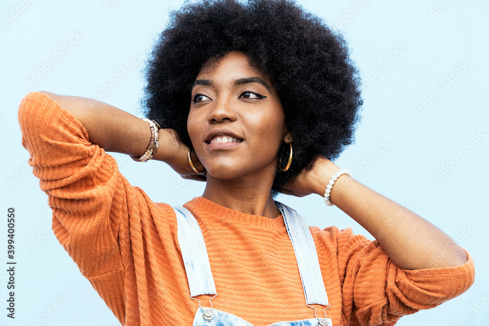 Side view portrait of a young afro woman Stock Photo | Adobe Stock
