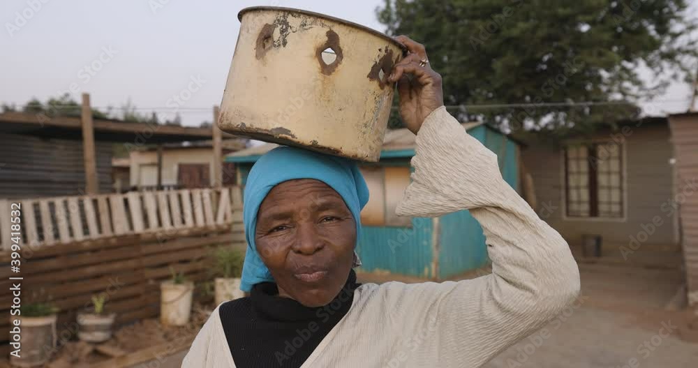 Face of poverty. Close-up portrait view of a poor Black African woman ...
